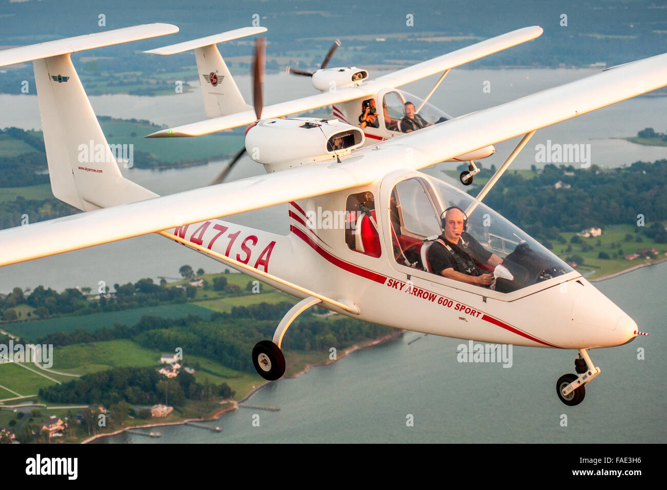 Aerial view of two planes at sunset during a formation flight Stock ...