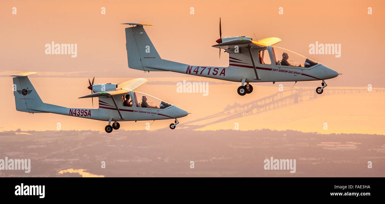 Aerial view of two planes at sunset during a formation flight Stock ...
