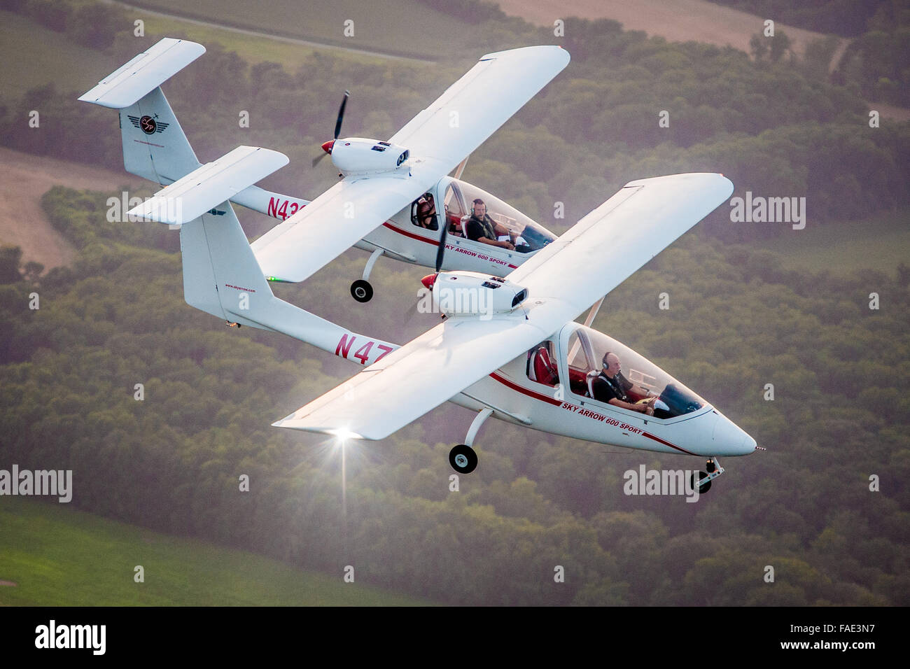 Aerial view of two planes at sunset during a formation flight Stock ...
