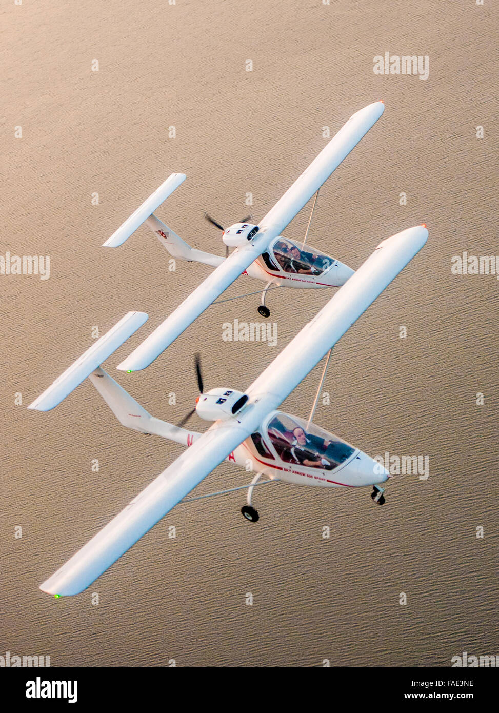 Aerial view of two planes at sunset during a formation flight Stock ...