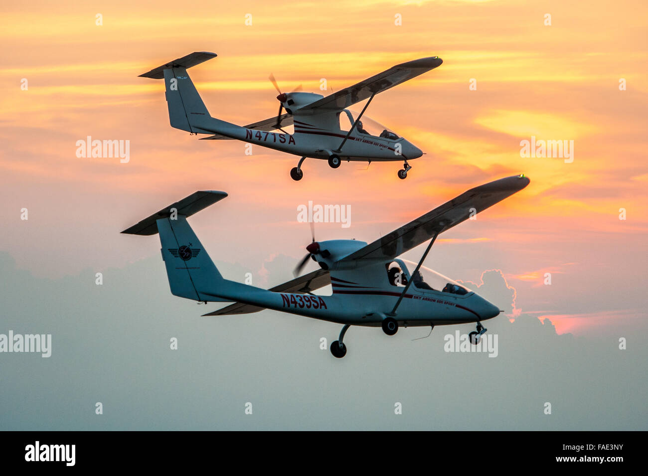 Aerial view of two planes at sunset during a formation flight Stock ...