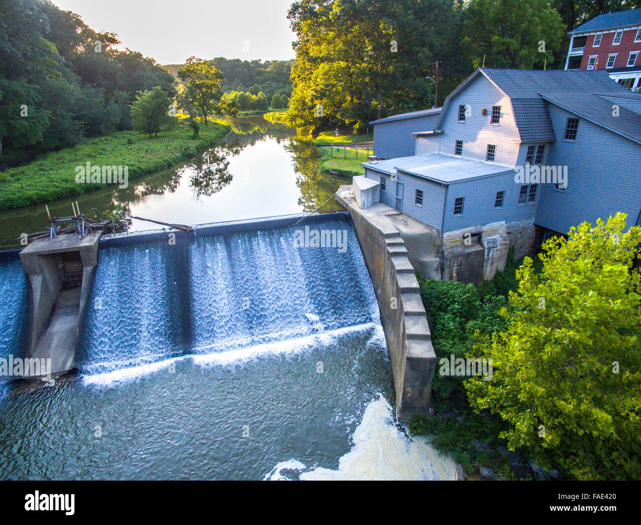Sunset over a dam in Eden Mill, Maryland Stock Photo - Alamy