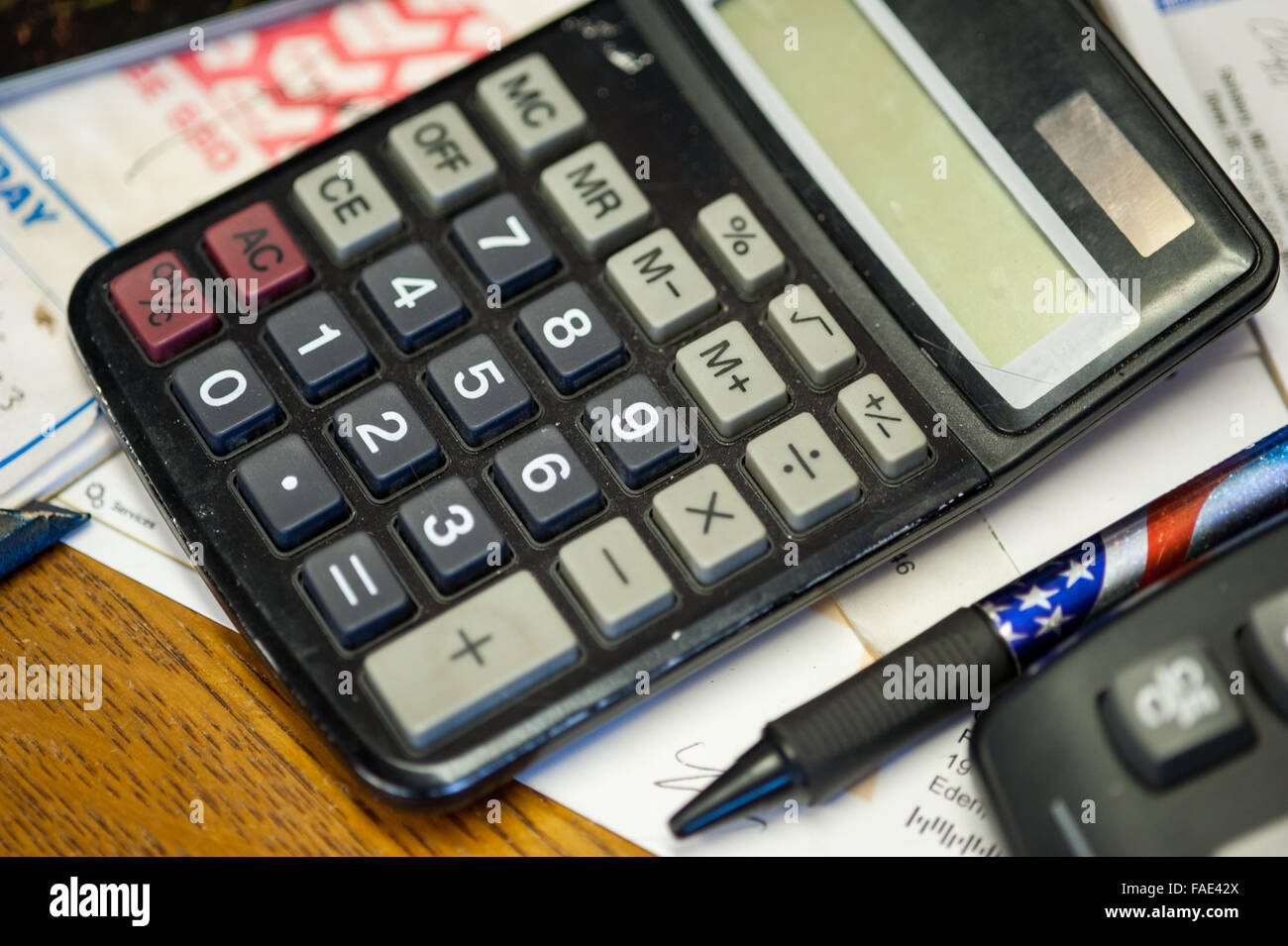 Calculator on desk Stock Photo - Alamy