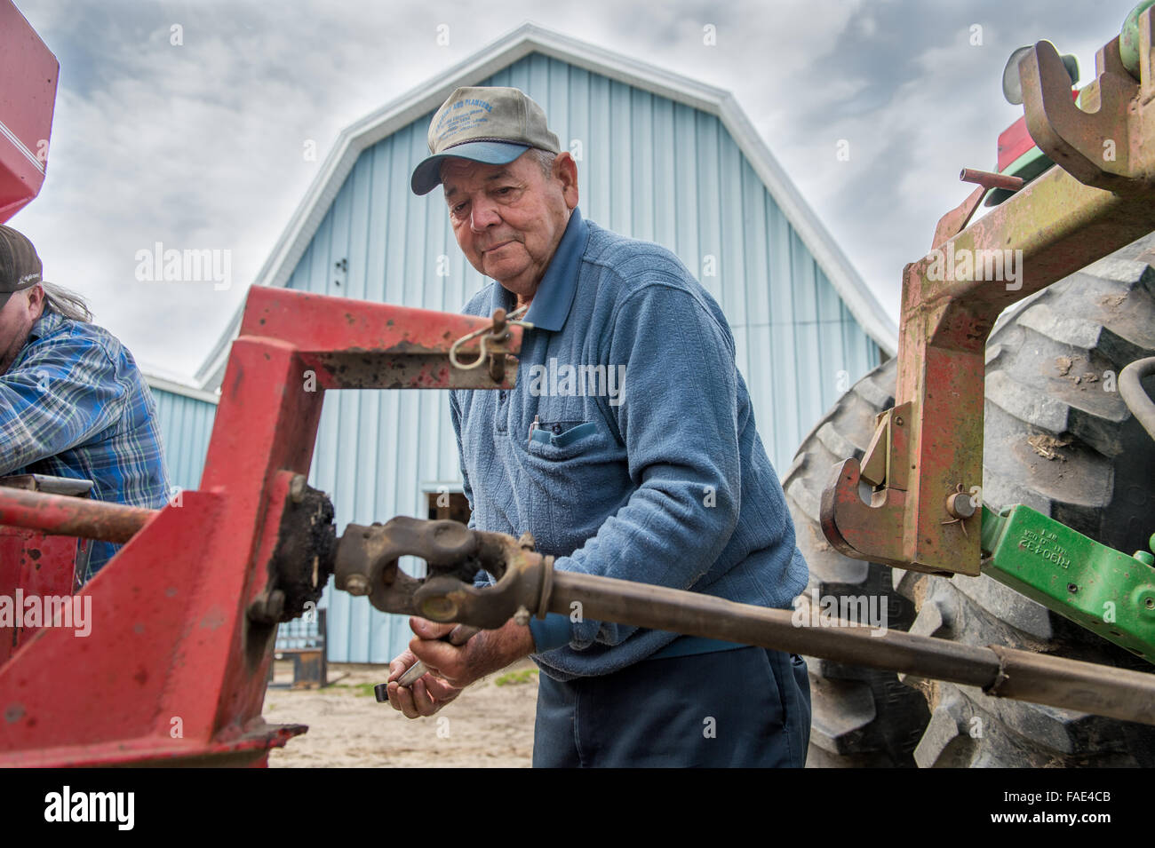 Farmer working on farming equipment in Eden, Maryland Stock Photo - Alamy