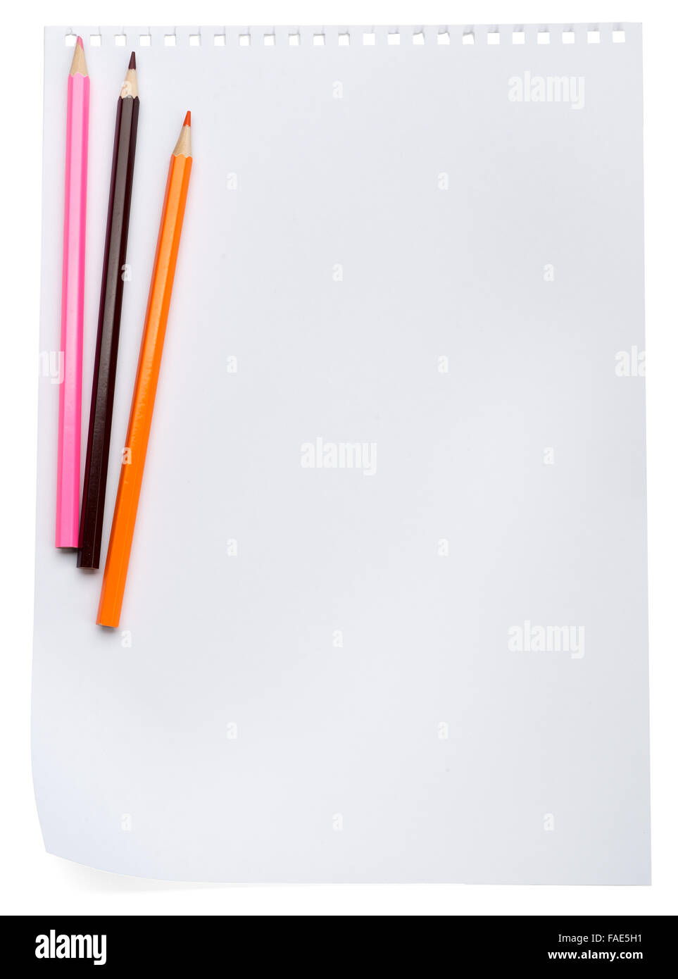 Piece of paper with crayons Stock Photo - Alamy