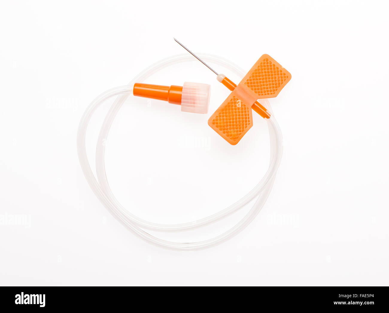 Orange butterfly catheter with open needle isolated on white background ...