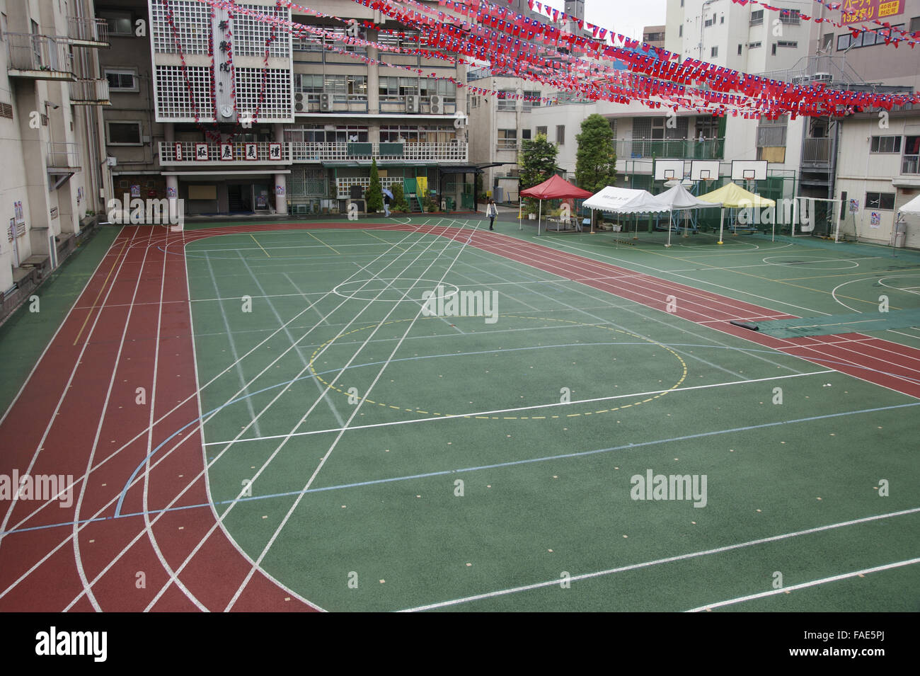 School playground cluttered running track markings Stock Photo - Alamy