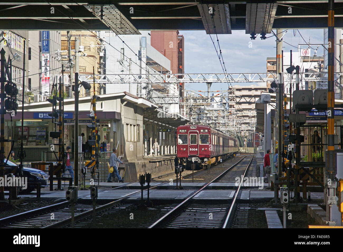 Japanese suburban train station level crossing Stock Photo - Alamy