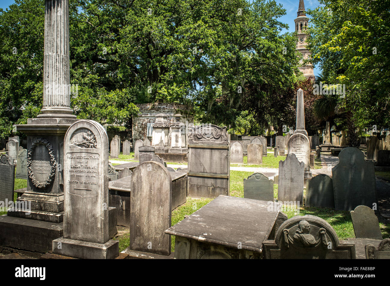 Cemetery behind a church Stock Photo - Alamy
