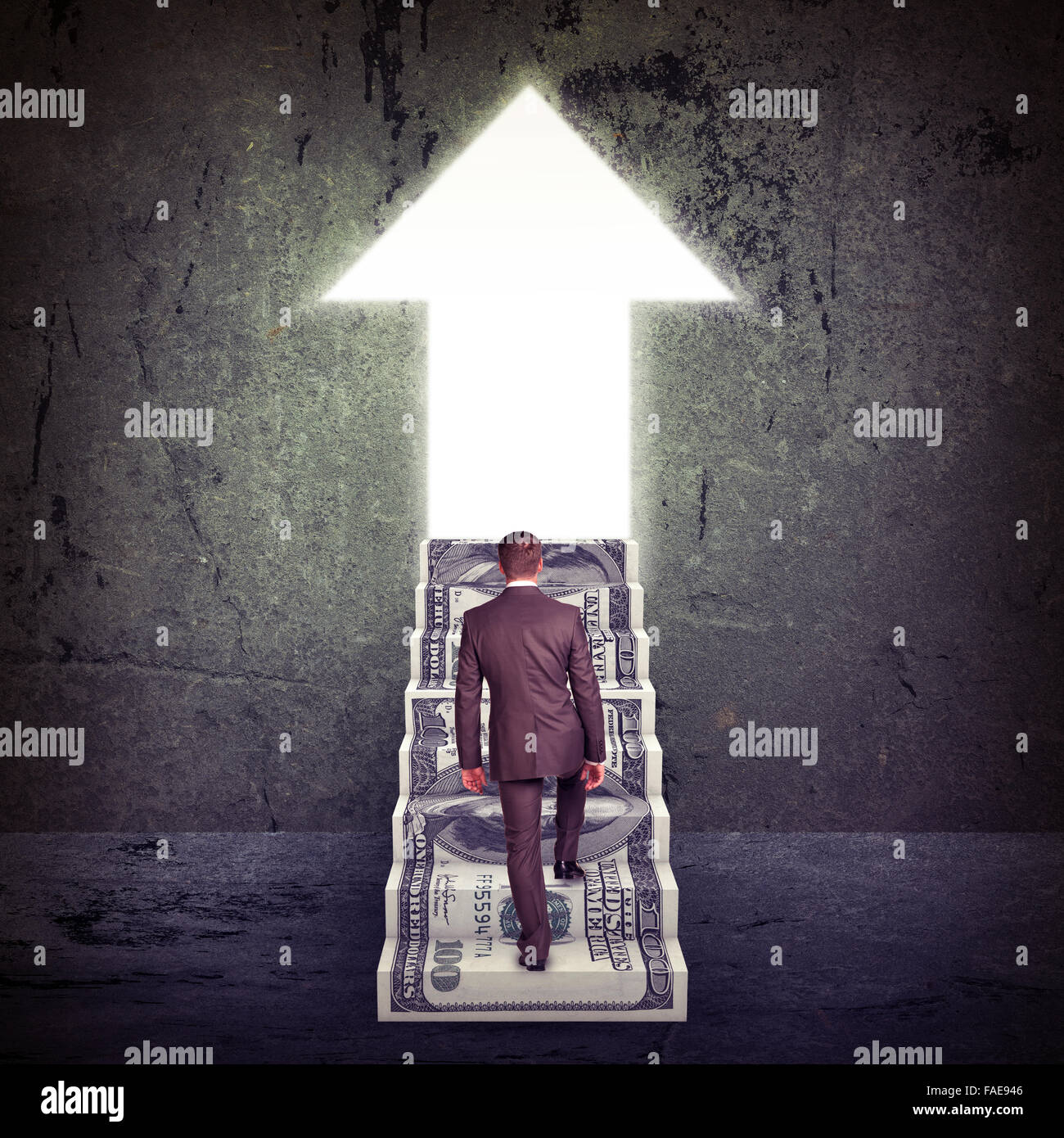Businessman climbing up stairs Stock Photo - Alamy