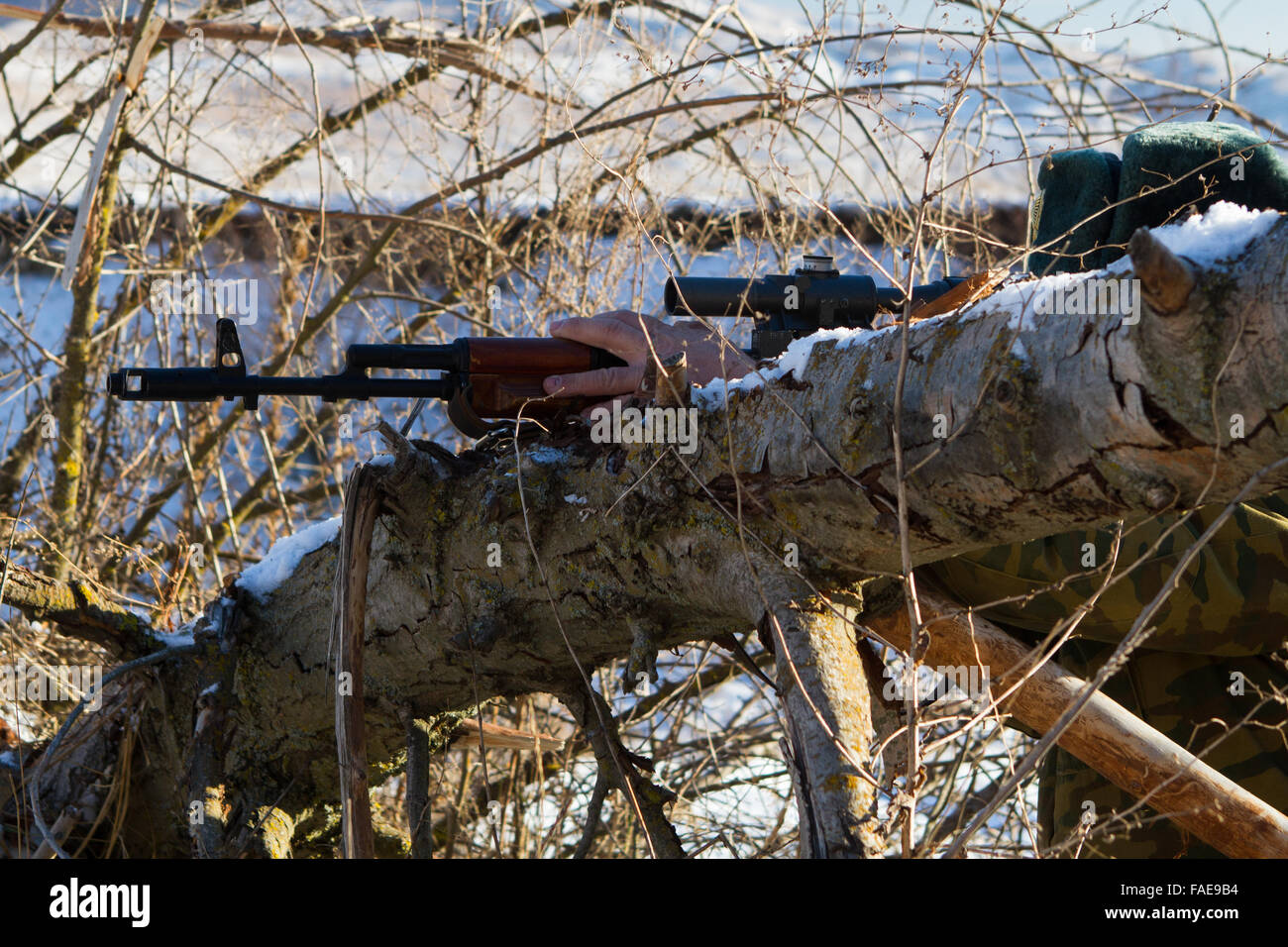 soldier or sniper holding gun with virtual screen projection and aiming ...