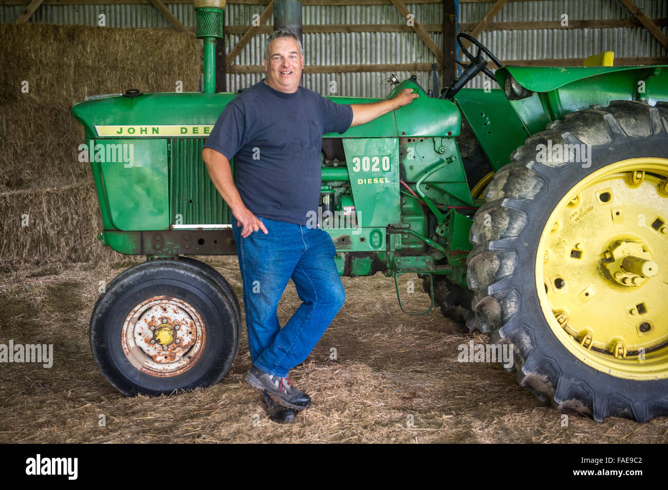 Farmer posing with tractor hi-res stock photography and images - Alamy
