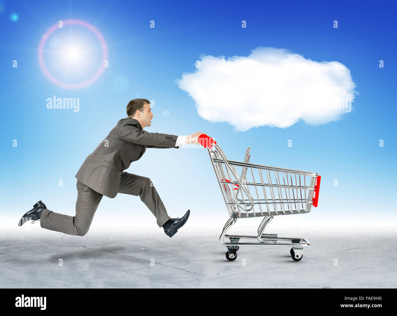Running businessman with empty shopping cart Stock Photo - Alamy