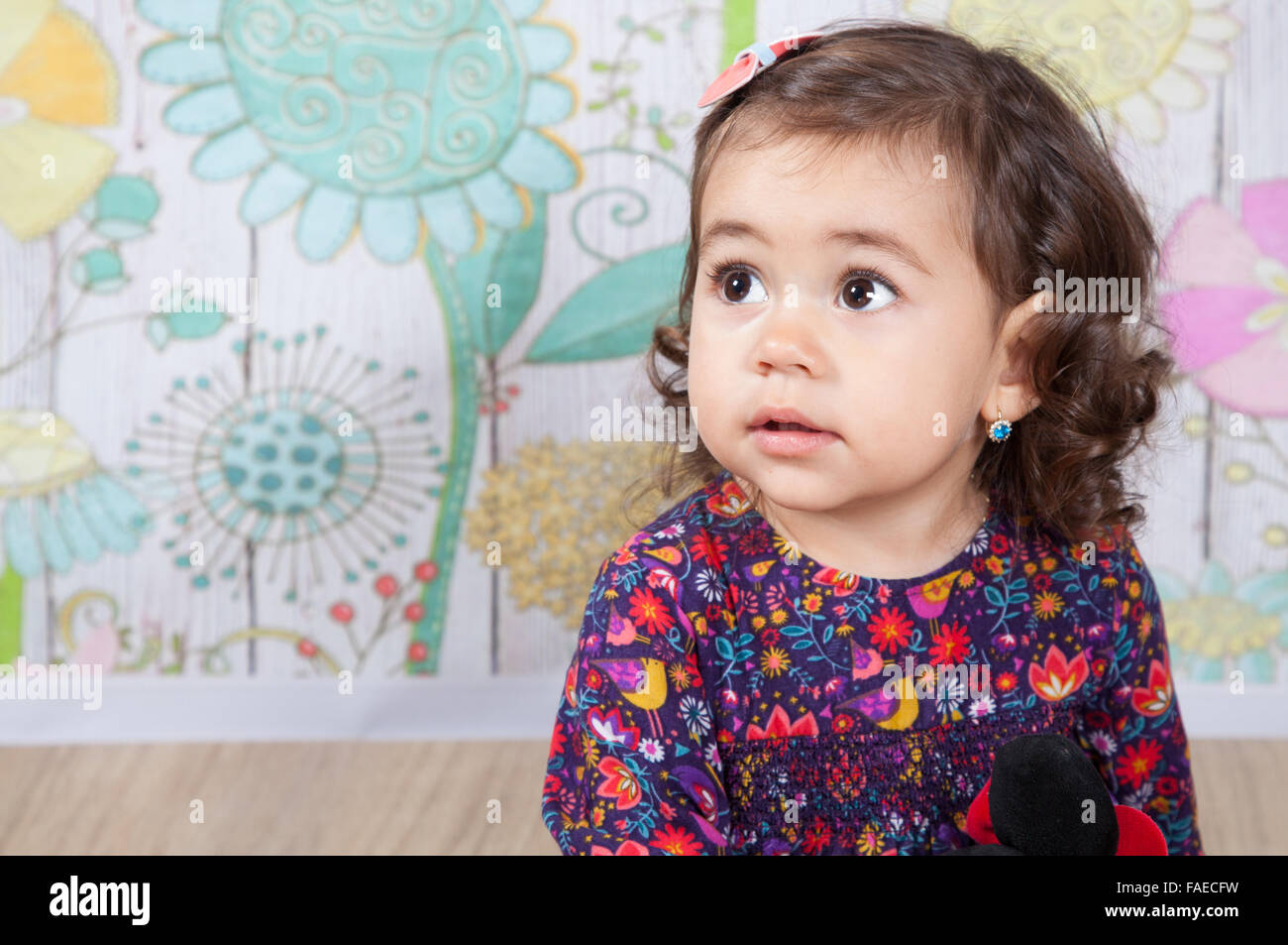 Portrait of 1 and a half gorgeous baby girl indoor Stock Photo - Alamy