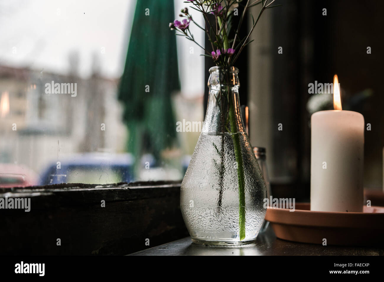 sitting at the window of the cafe Stock Photo - Alamy