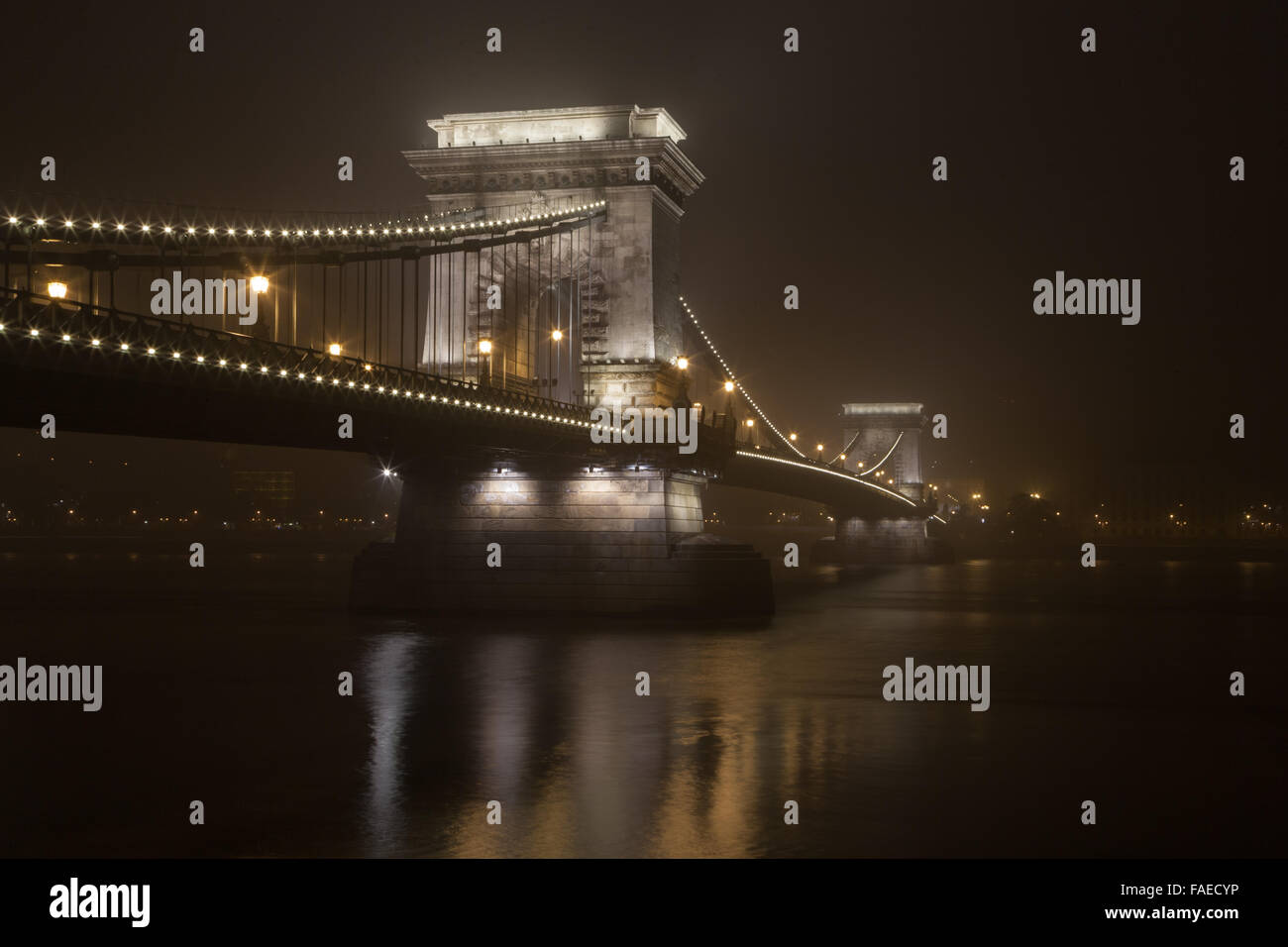 Chain Bridge at night, reflecting in the Danube River, Budapest Hungary ...