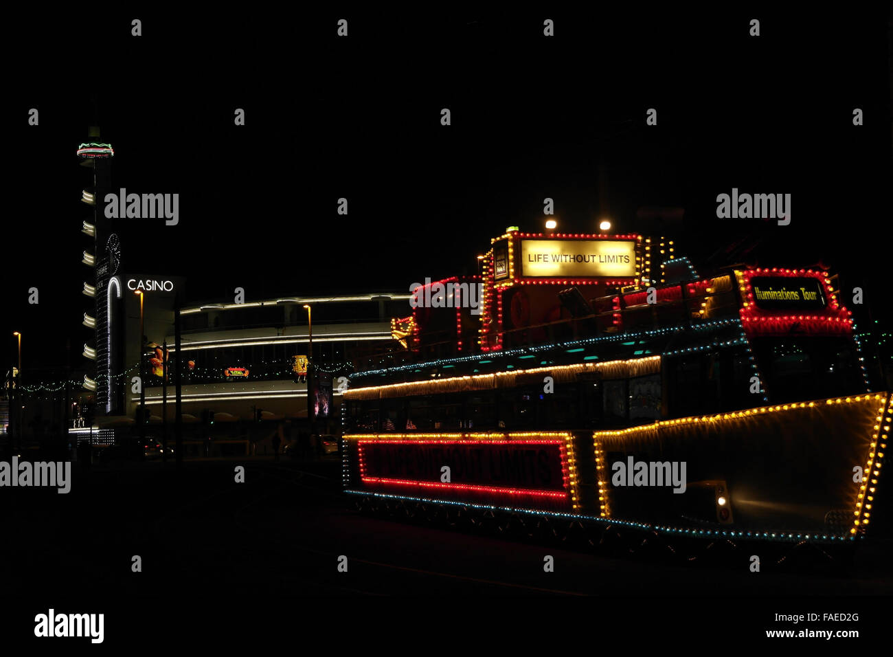 Night view Pleasure Beach Casino, illuminated HMS Blackpool frigate ...