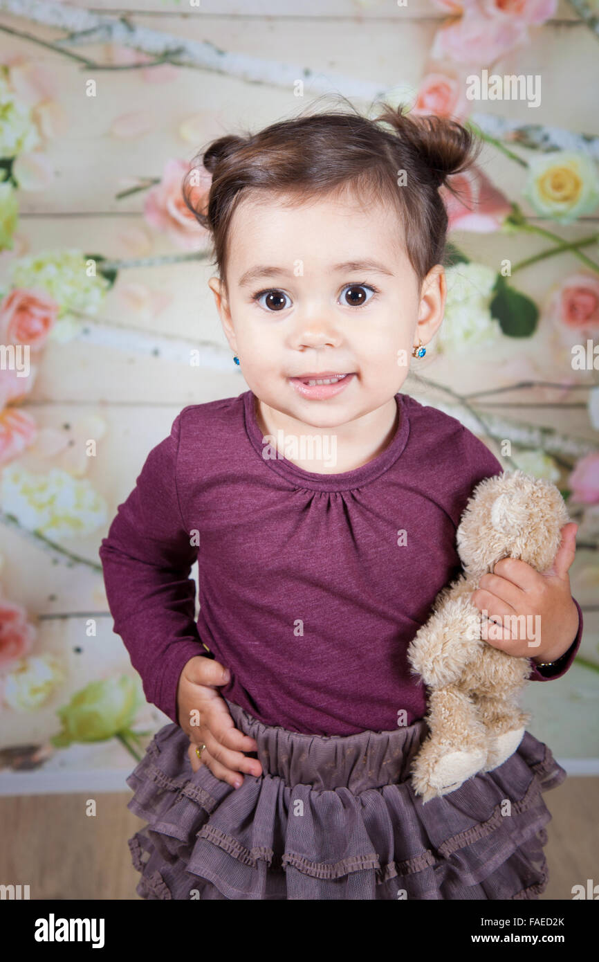 Portrait of 1 and a half gorgeous baby girl indoor Stock Photo - Alamy