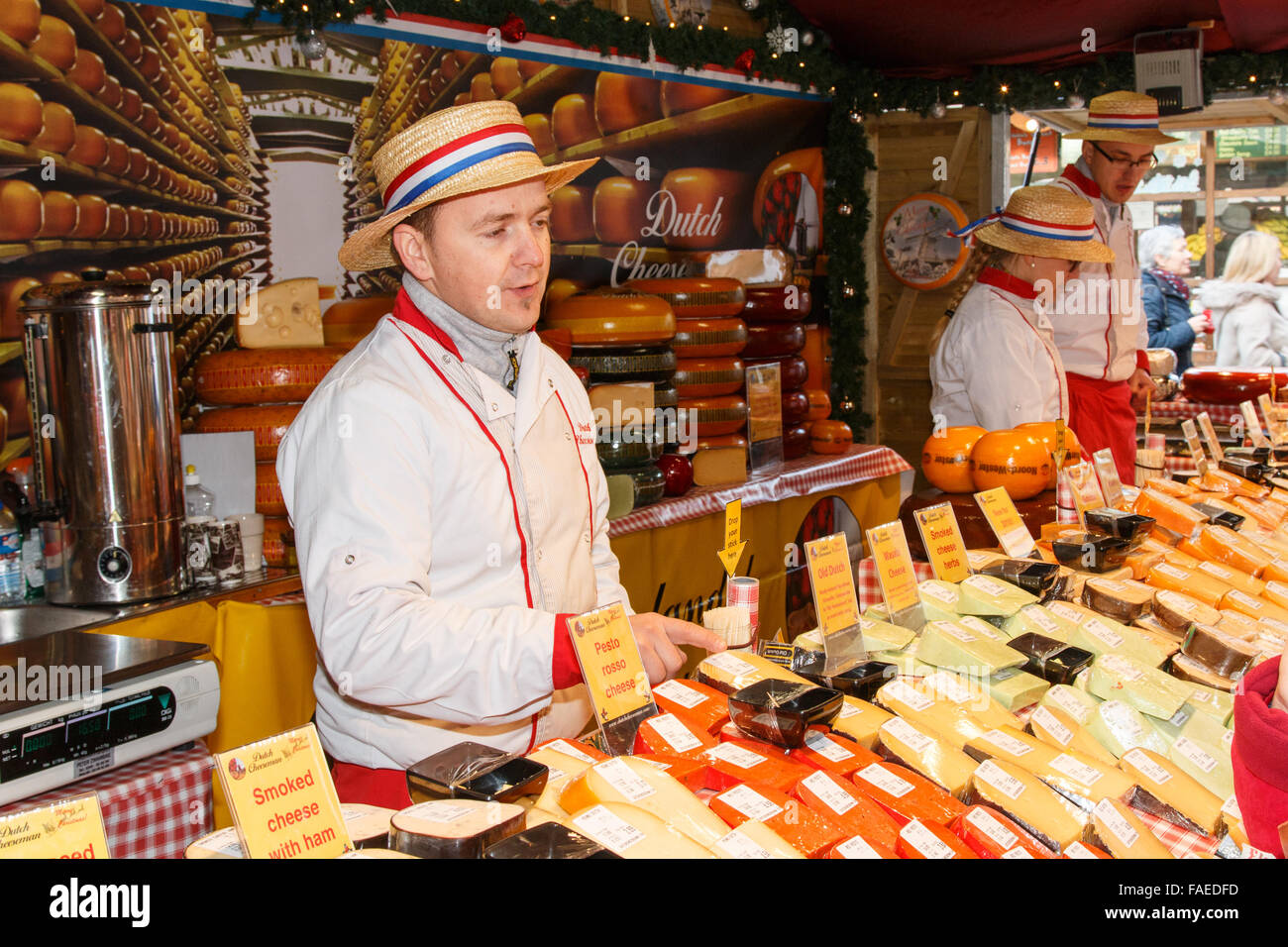 Dutch cheese stall and stallholder at the Manchester Christmas market ...