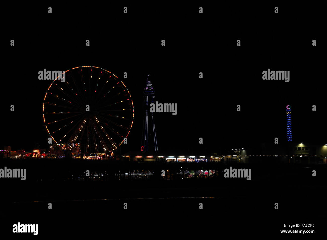 Night beach view to Central Pier Big Wheel, blue white Blackpool Tower ...