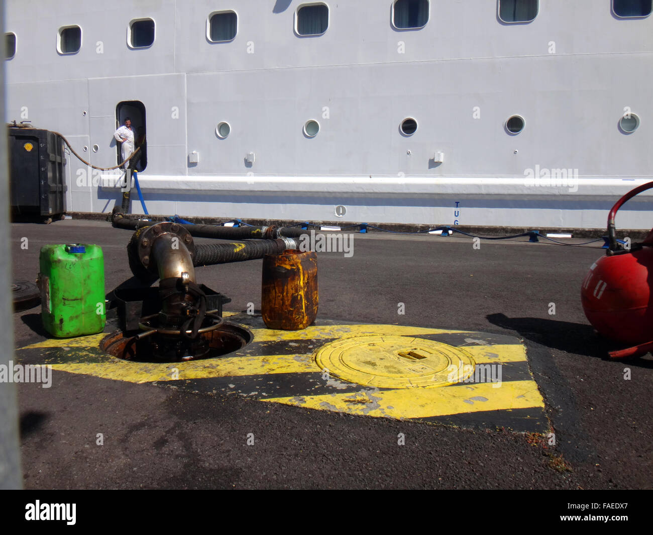 Pumping fresh water from the dock to the ship, Papeete, French ...