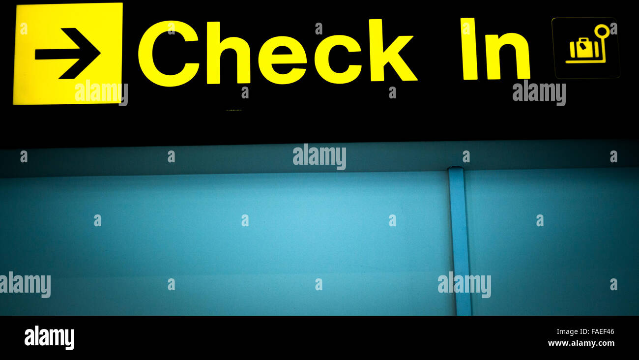 Airport information sign light panel giving directions for checkin for ...