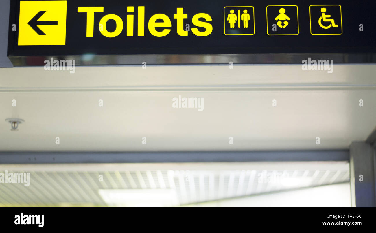 Airport information sign light panel giving directions in departure ...