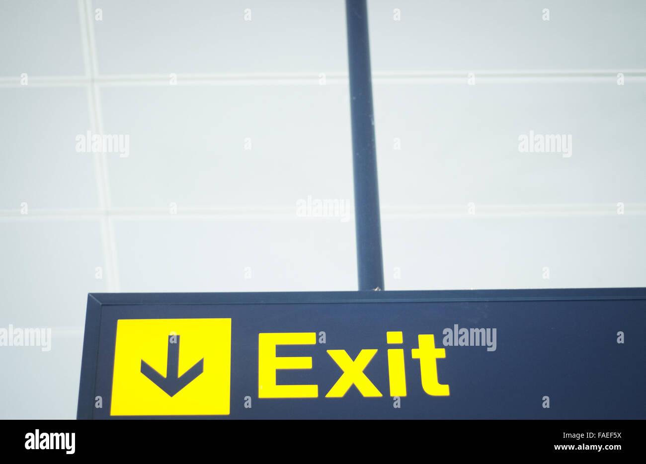 Airport information sign light panel giving directions for exit in ...