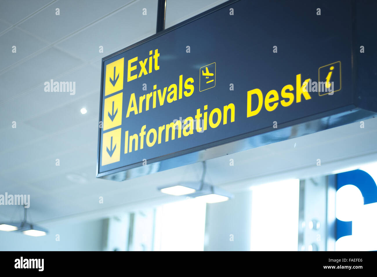 Airport information sign light panel giving directions for exit in ...