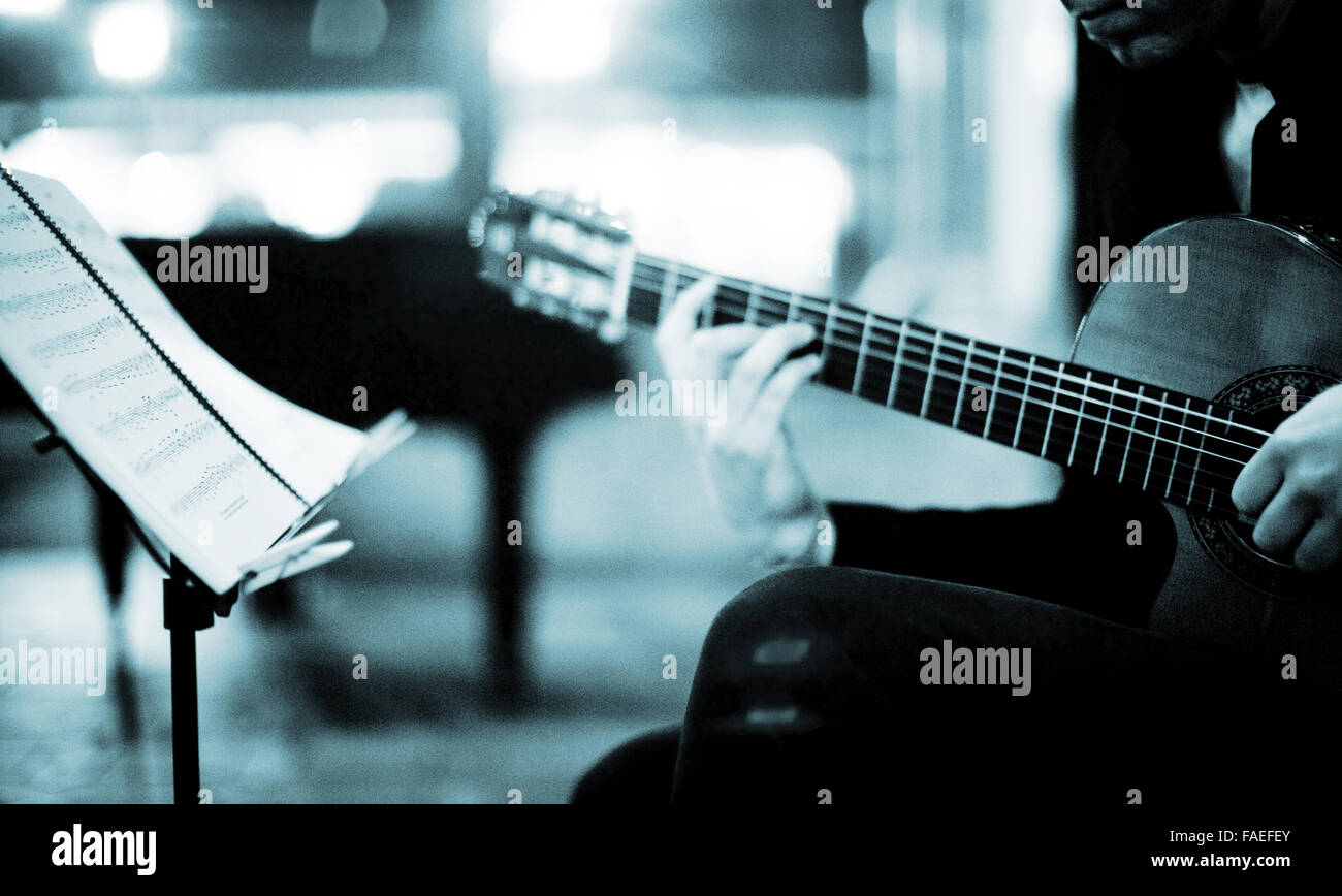 Guitar player musician in recording studio photo Stock Photo - Alamy