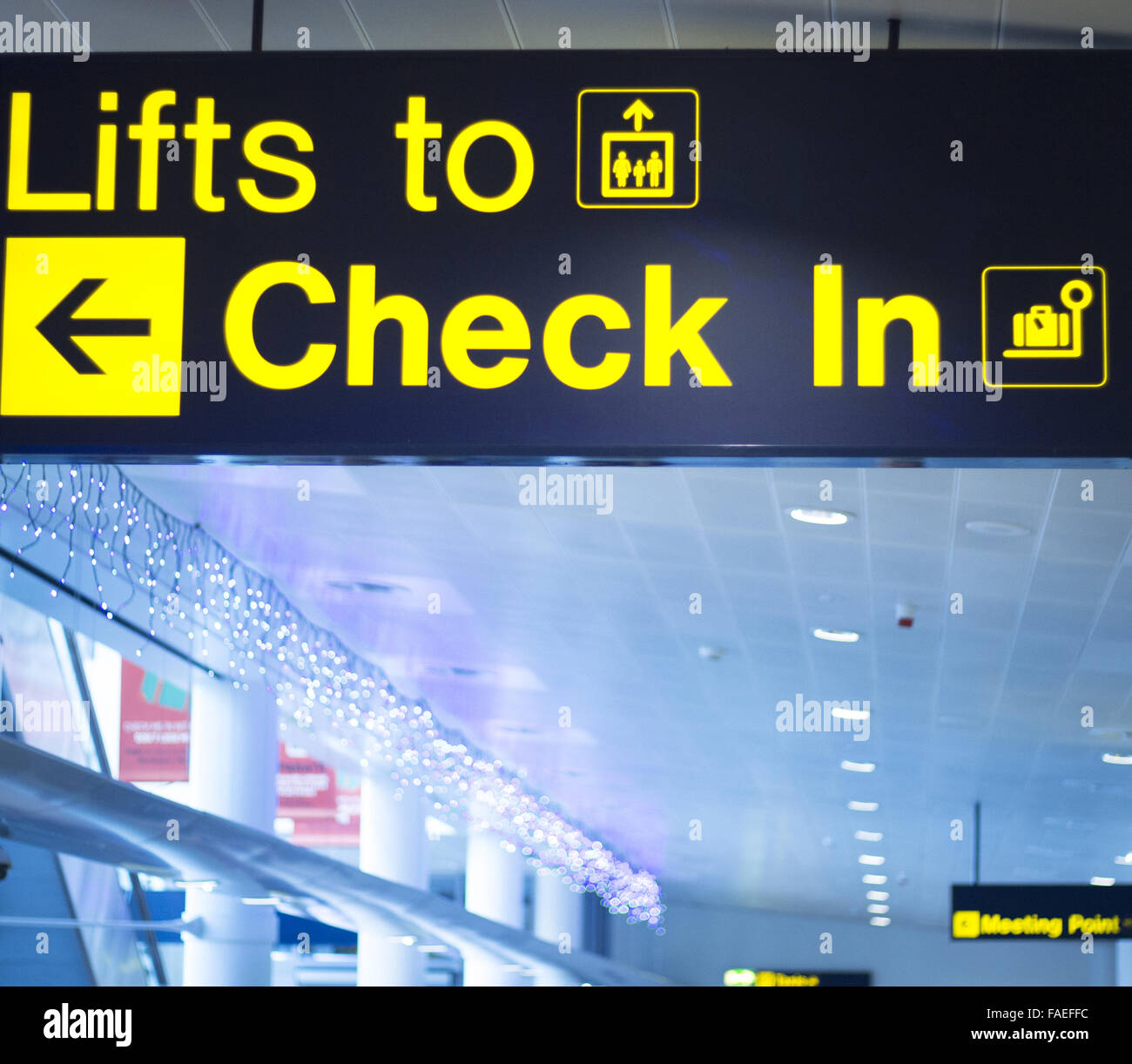Airport information sign light panel giving directions in departure ...