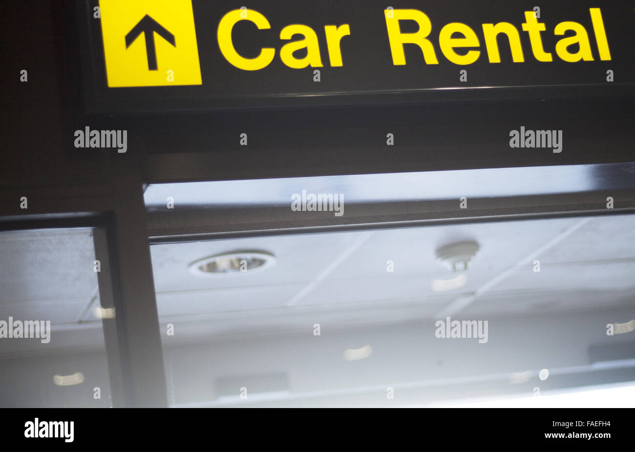 Airport information car rental sign light panel giving directions in ...