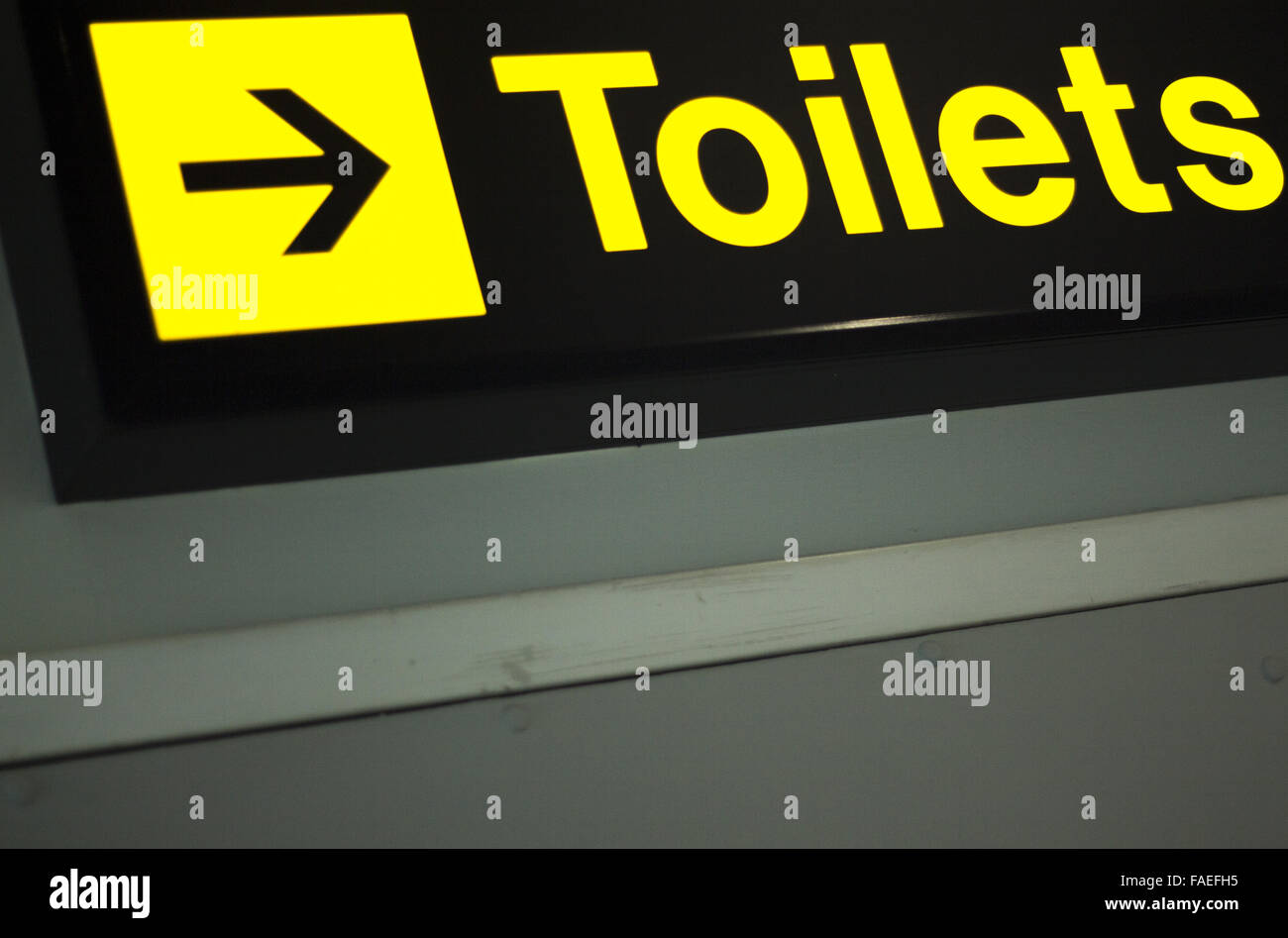 Airport information sign light panel giving directions in departure ...