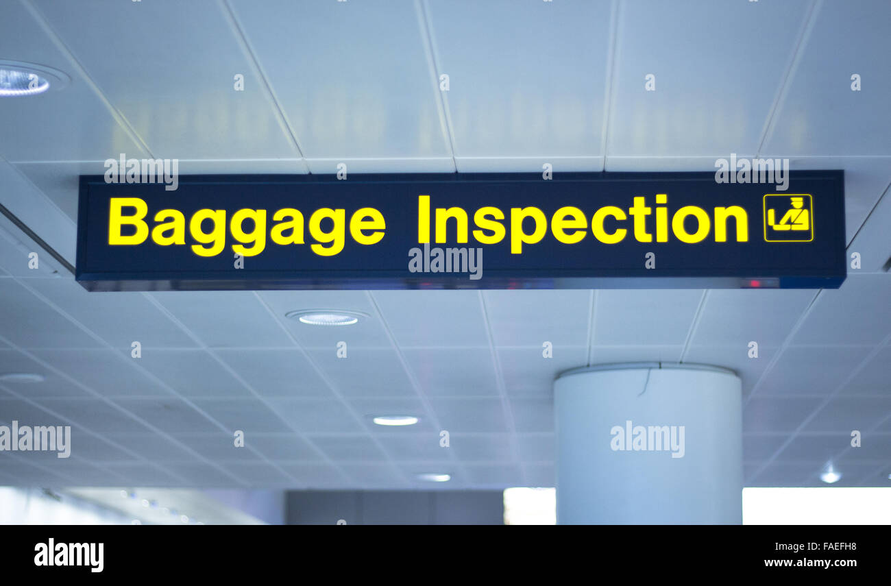 Airport baggage inspection information sign light panel giving ...