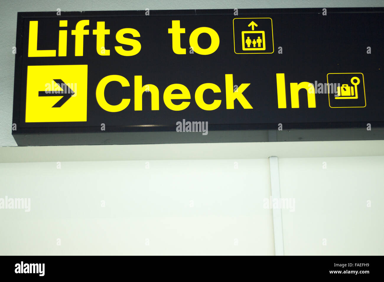 Airport information sign light panel giving directions for checkin for ...