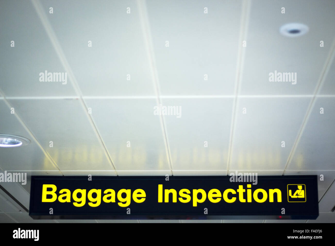 Airport baggage inspection information sign light panel giving ...