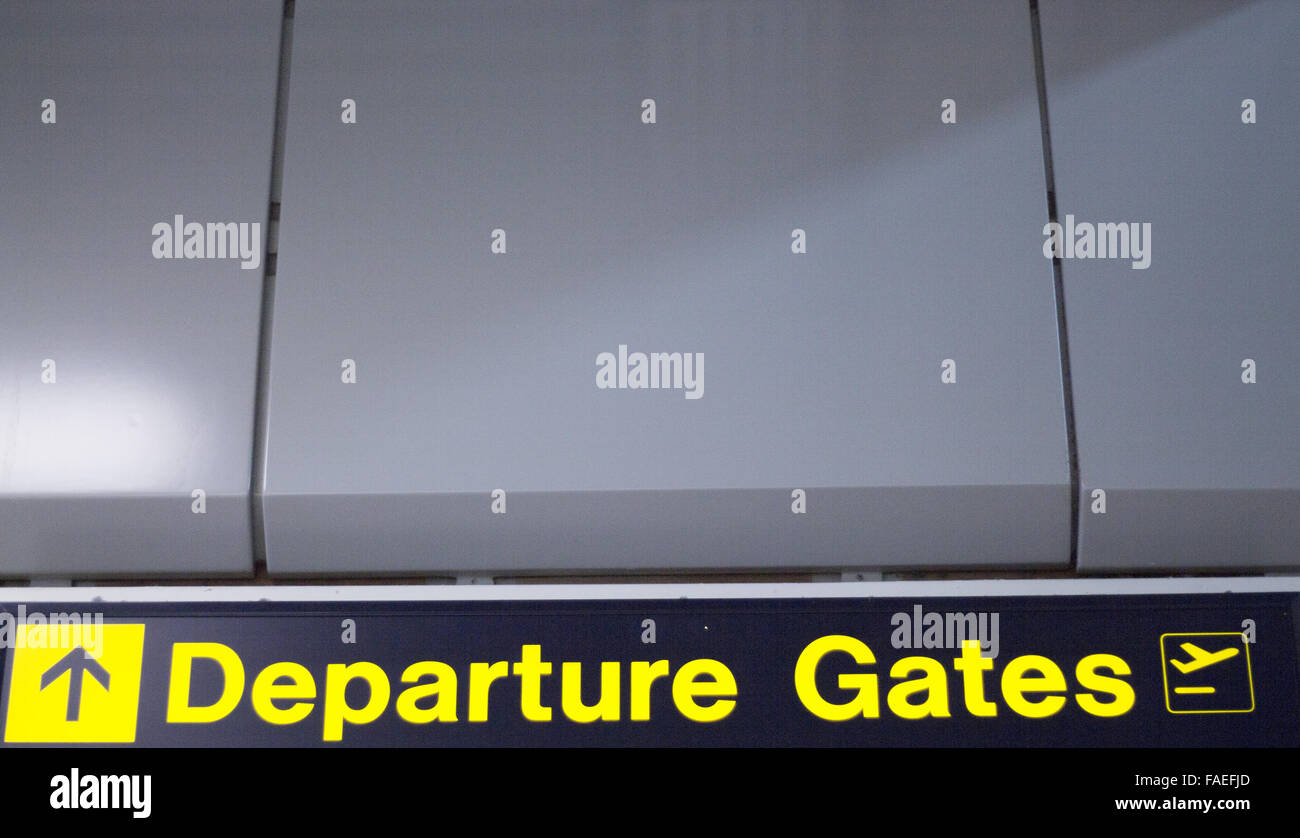 Airport information departures gatessign light panel giving directions ...