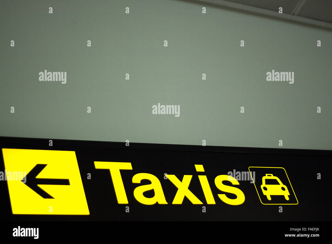 Airport information sign light panel giving directions in arrivals ...