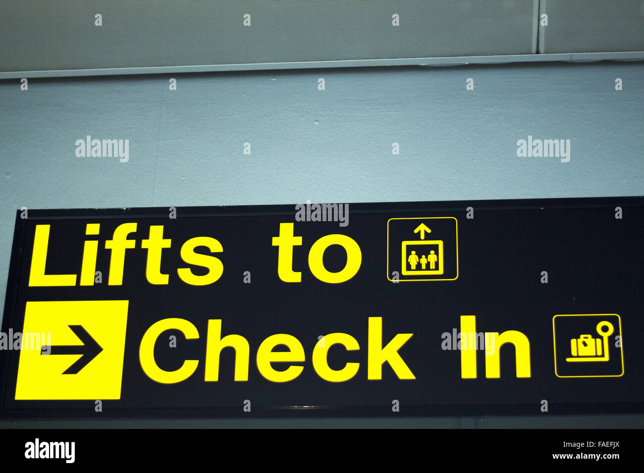Airport information sign light panel giving directions for checkin for ...