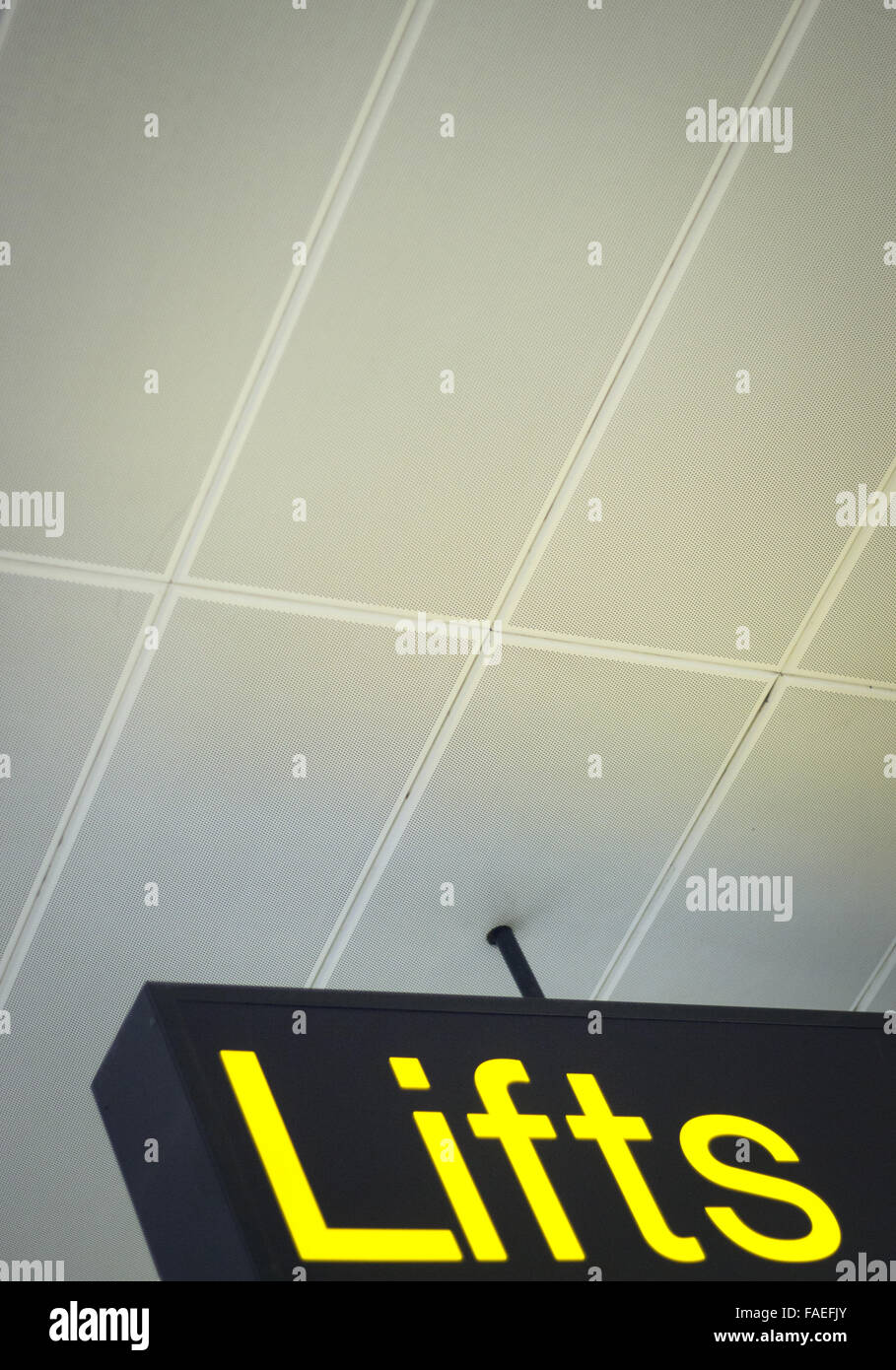 Airport information sign light panel giving directions for lifts in ...