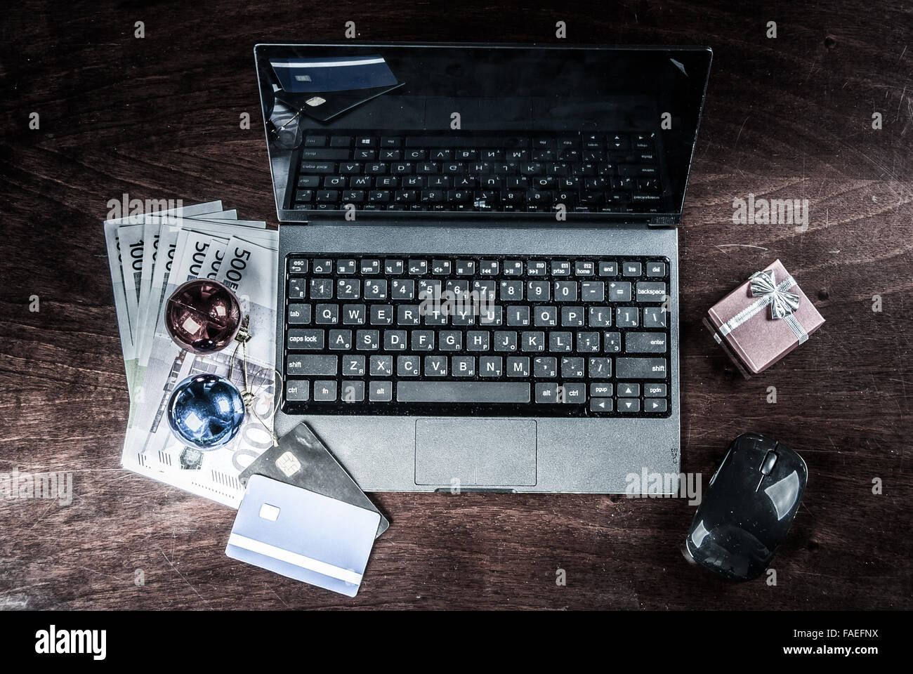 black laptop on wood Stock Photo - Alamy
