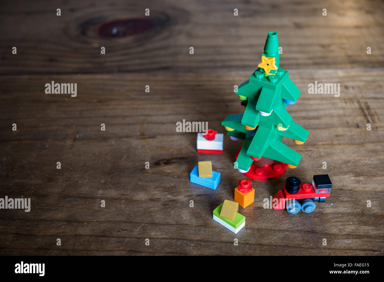 Toy Christmas Tree with Presents Stock Photo - Alamy