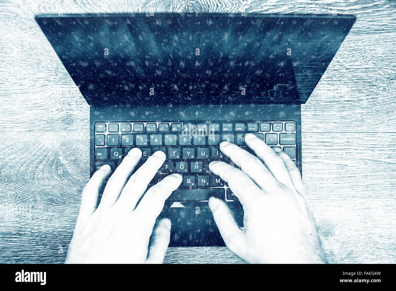 laptop with hands on wood Stock Photo - Alamy