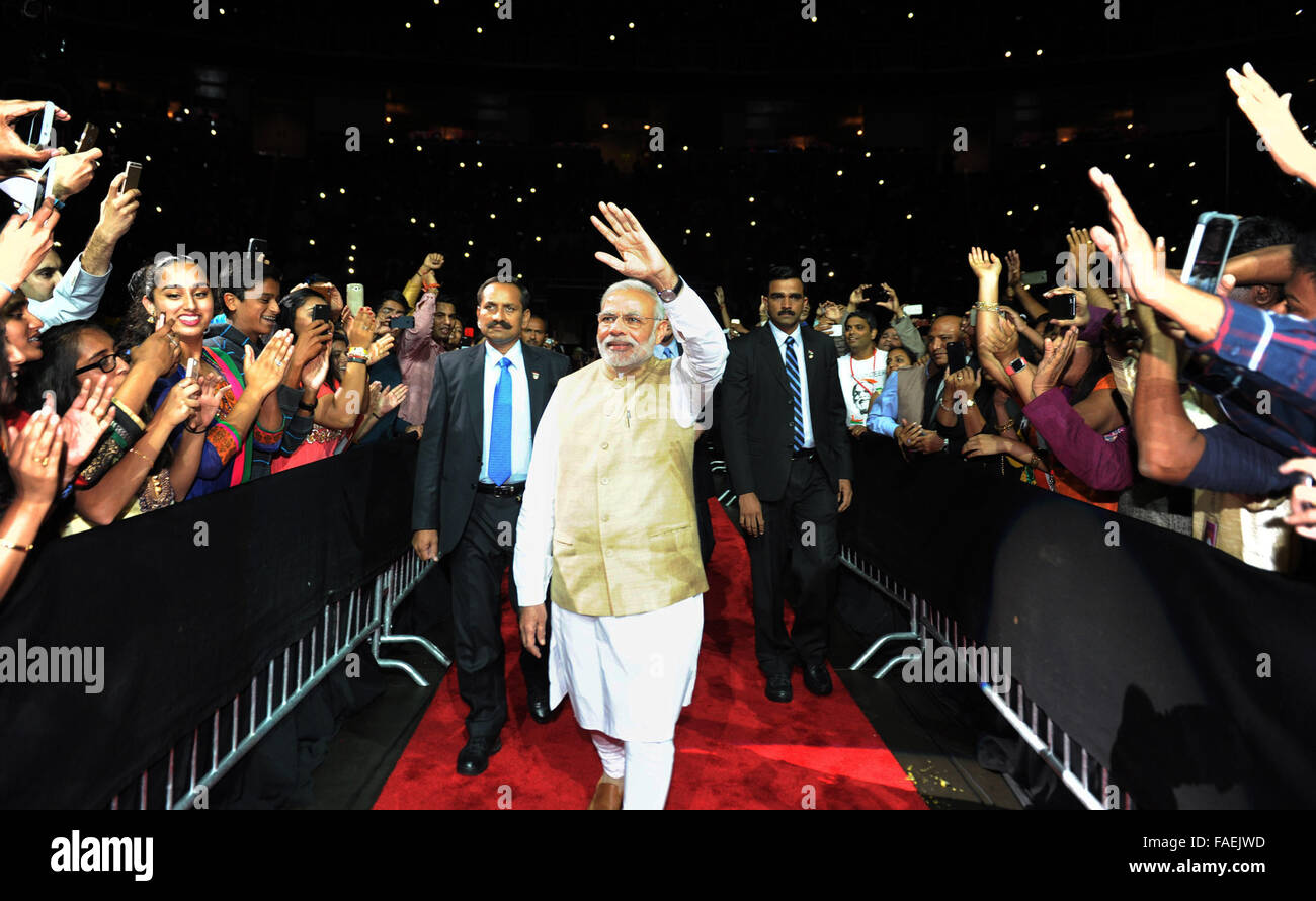 Indian Prime Minister Narendra Modi waves to supporters as he arrives ...
