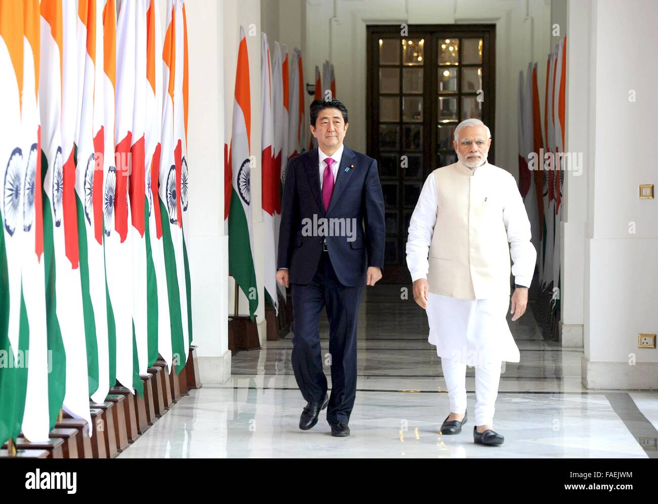 Indian Prime Minister Narendra Modi walks with Japanese Prime Minister ...