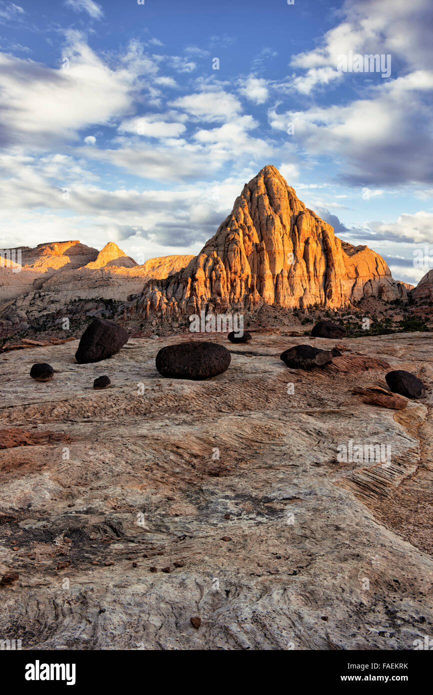 Last light on Pectol’s Pyramid towering over these black lava boulders ...