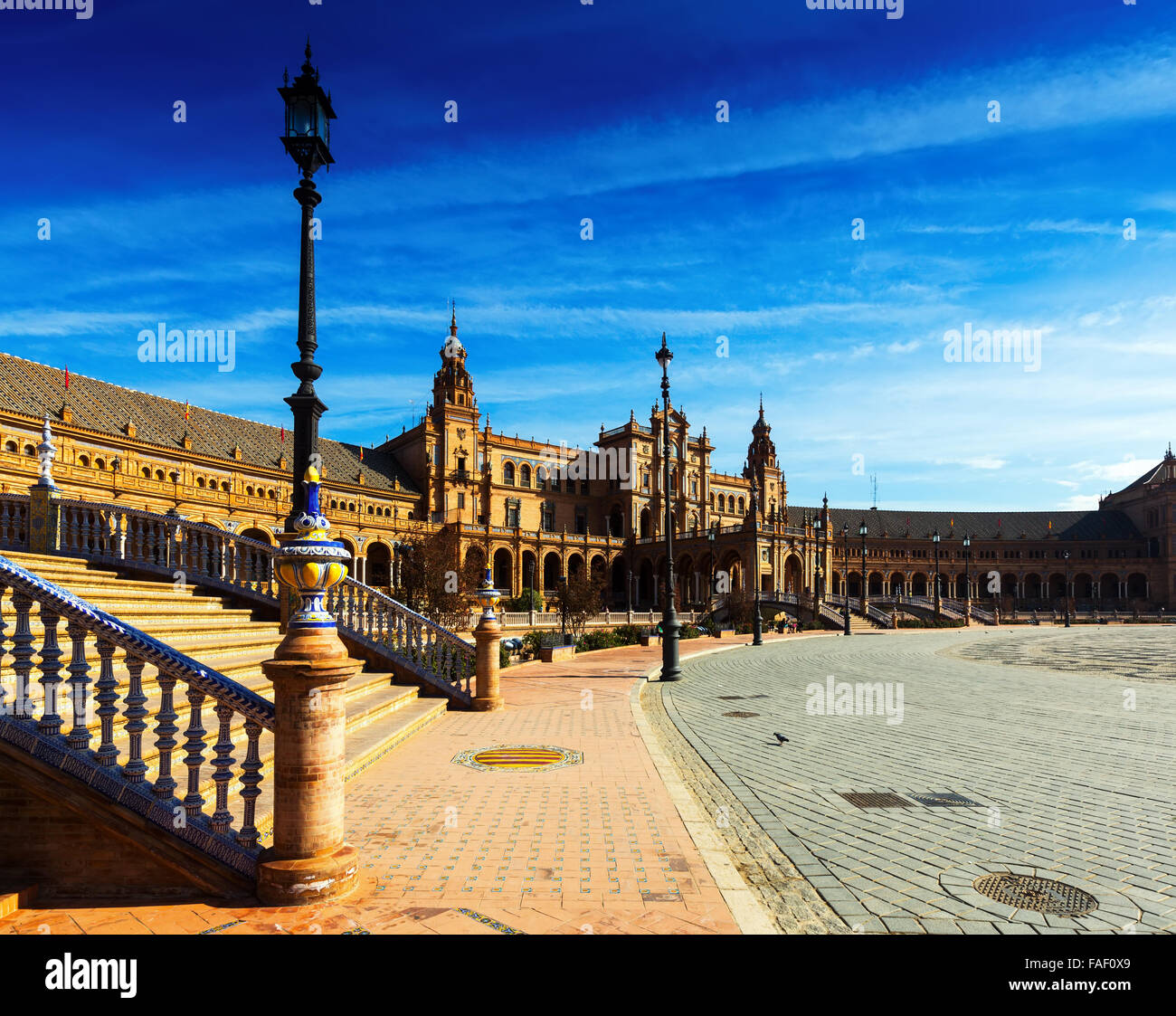 sunny view of central building and bridges at Plaza de Espana. Seville ...