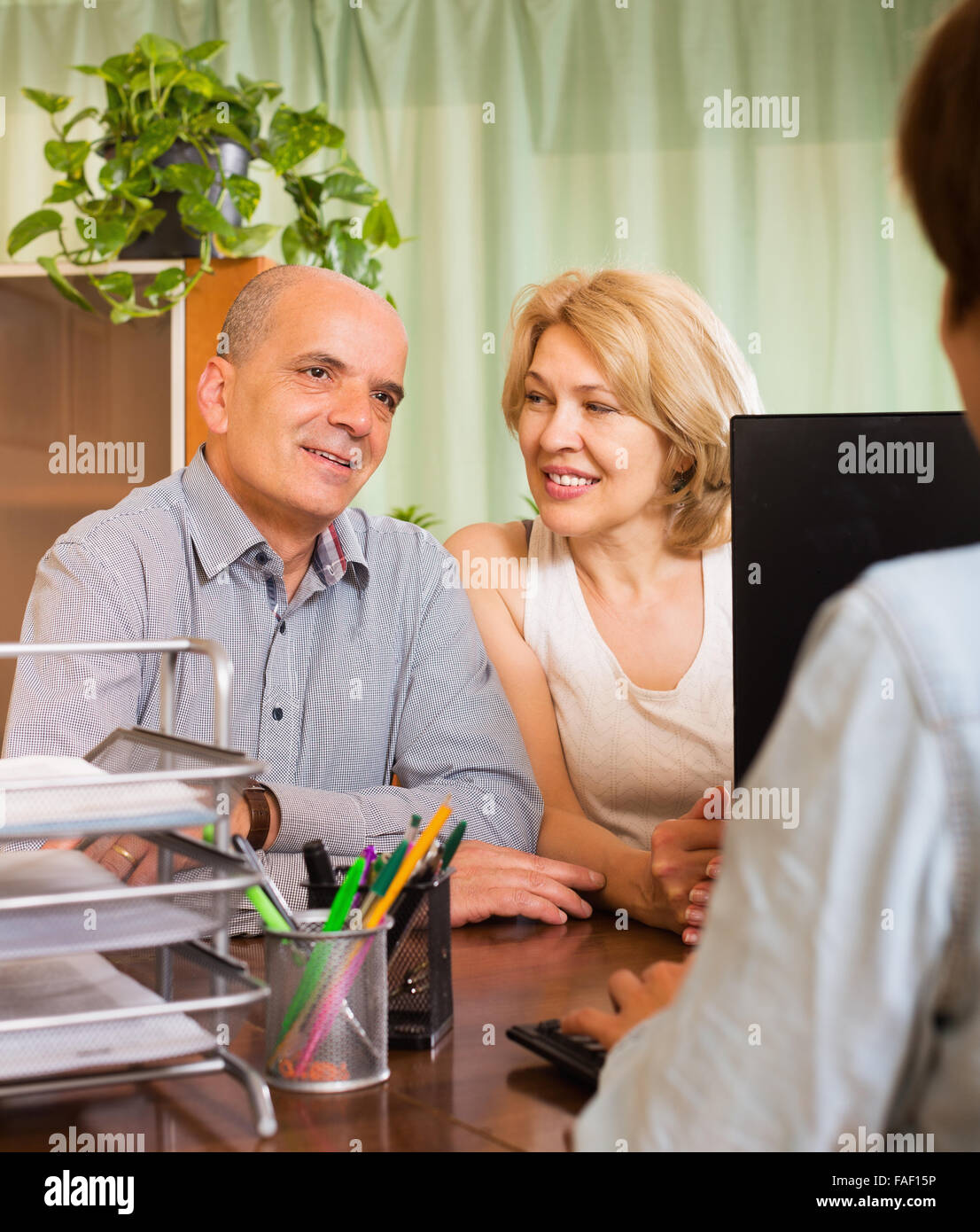 Woman opening bank account hi-res stock photography and images - Alamy