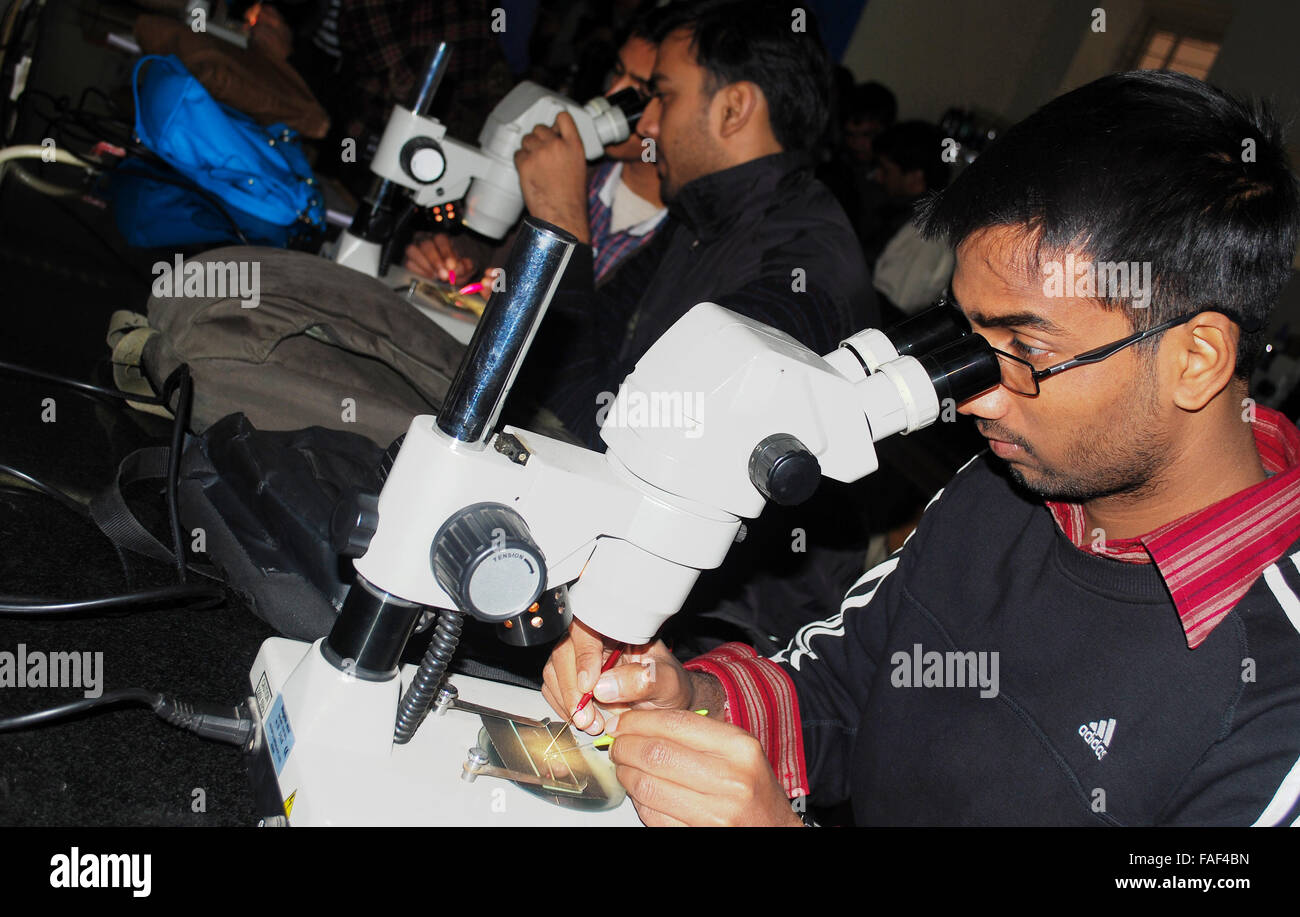Student working in Biology Lab with Microscope Stock Photo - Alamy
