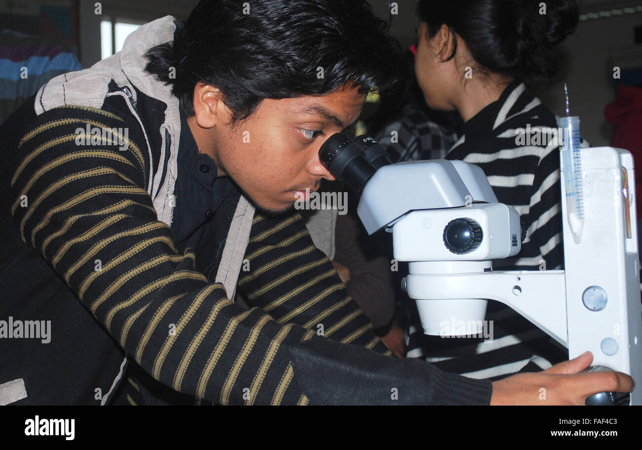 Student working in Biology Lab with Microscope Stock Photo - Alamy